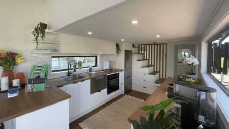 Harmony Tiny House Fits Two Bedrooms in Storage-Friendly Layout