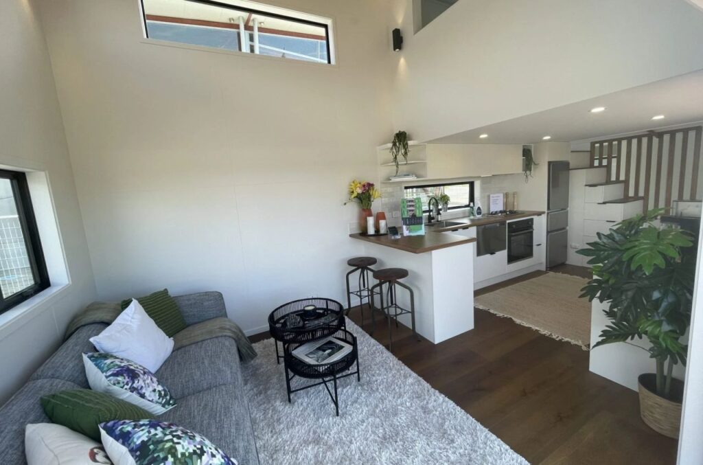 Harmony Tiny House Fits Two Bedrooms in Storage-Friendly Layout