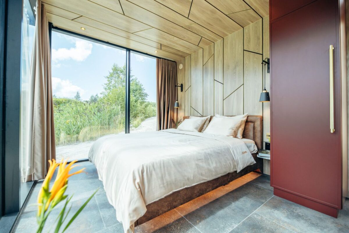 Golden Tiny House has a Glow Changing Shimmering Glass Body
