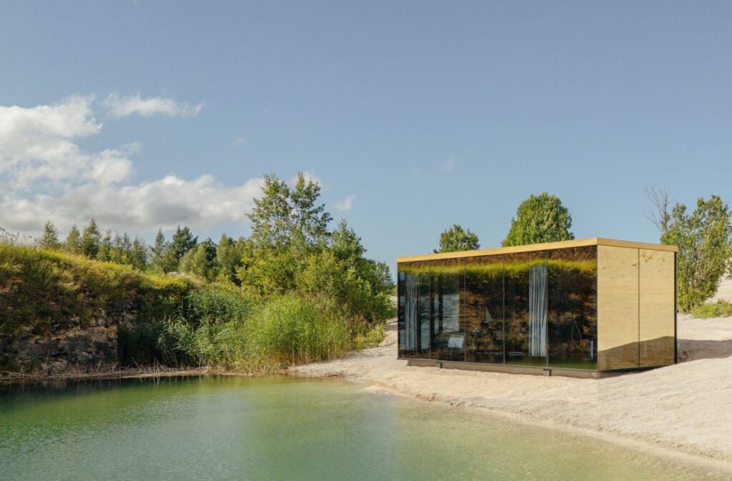 Golden Tiny House has a Glow Changing Shimmering Glass Body