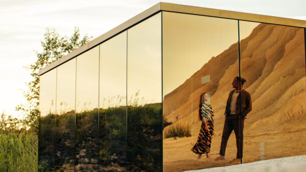 Golden Tiny House has a Glow Changing Shimmering Glass Body