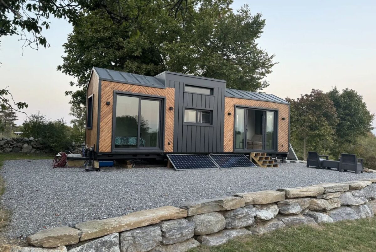 Steel Frame Tiny House has Downstairs Bedroom, Versatile Loft