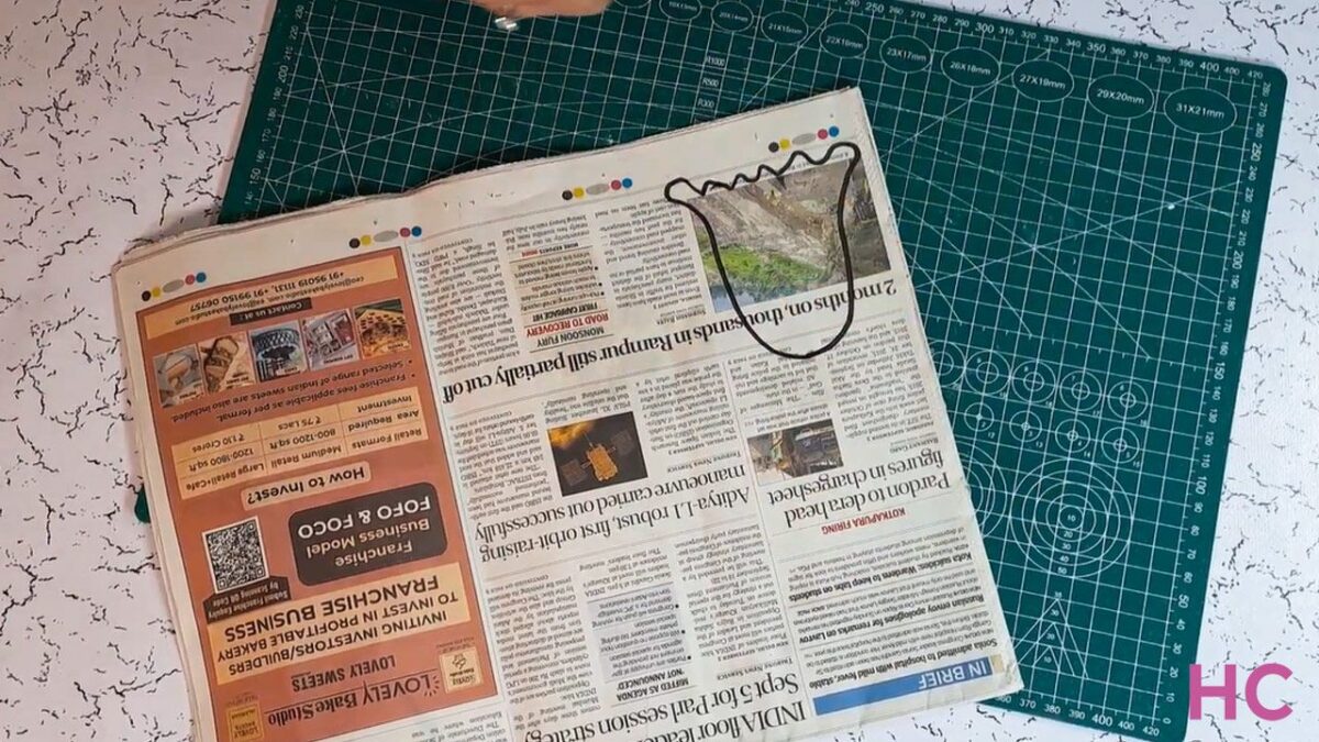 This Last-Minute Newspaper Ghost Garland is Effortless to Make