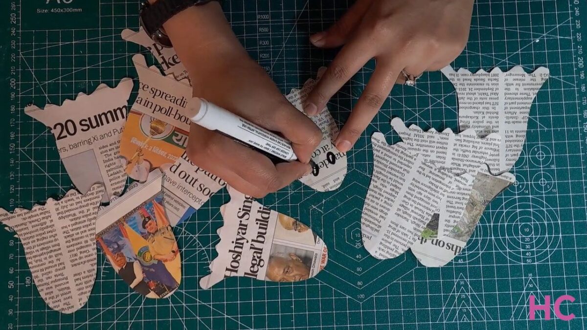 This Last-Minute Newspaper Ghost Garland is Effortless to Make