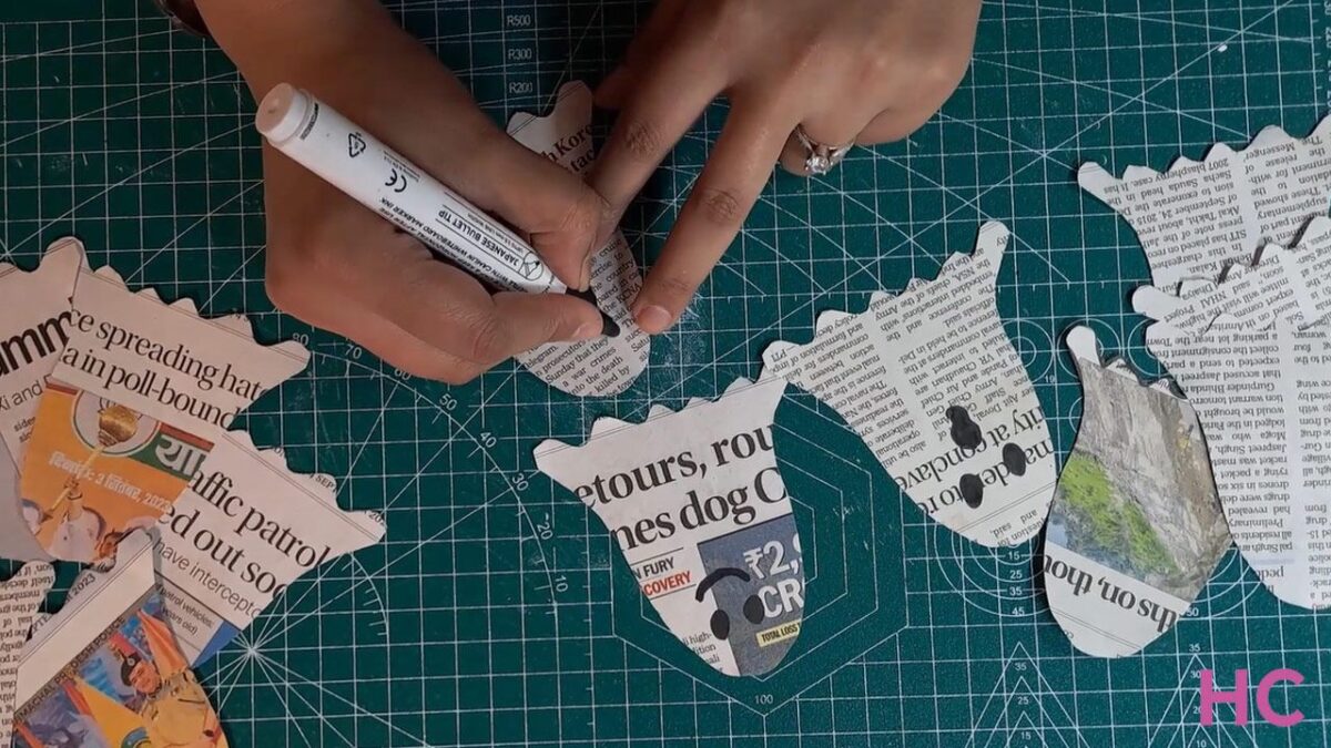 This Last-Minute Newspaper Ghost Garland is Effortless to Make