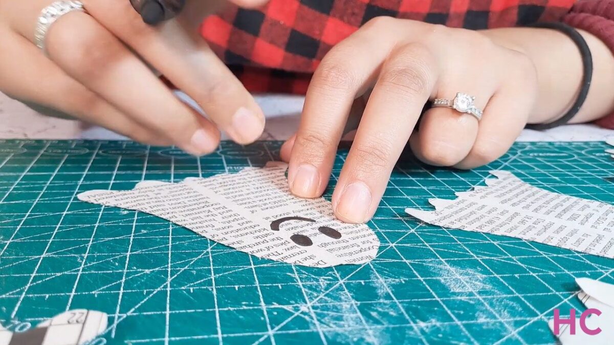 This Last-Minute Newspaper Ghost Garland is Effortless to Make