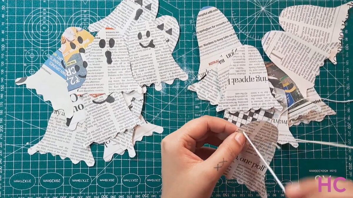 This Last-Minute Newspaper Ghost Garland is Effortless to Make