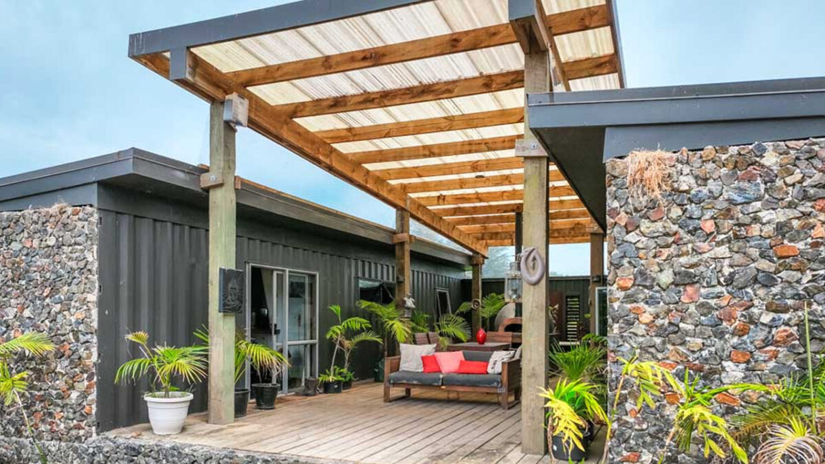 Man Converts Shipping Containers Into Off-Grid Haven With Atrium