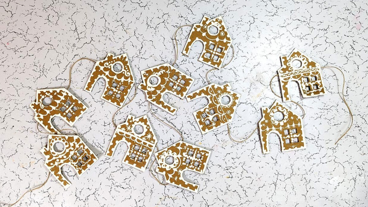 DIY Gingerbread House Garland Upcycles Cardboard Into Décor
