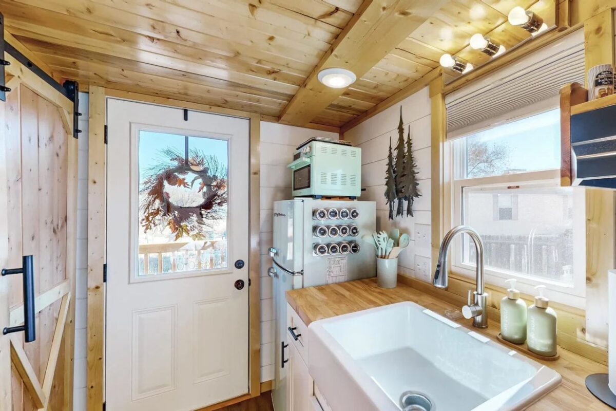 Evergreen Tiny House is Cottage on Wheels With Country Charm
