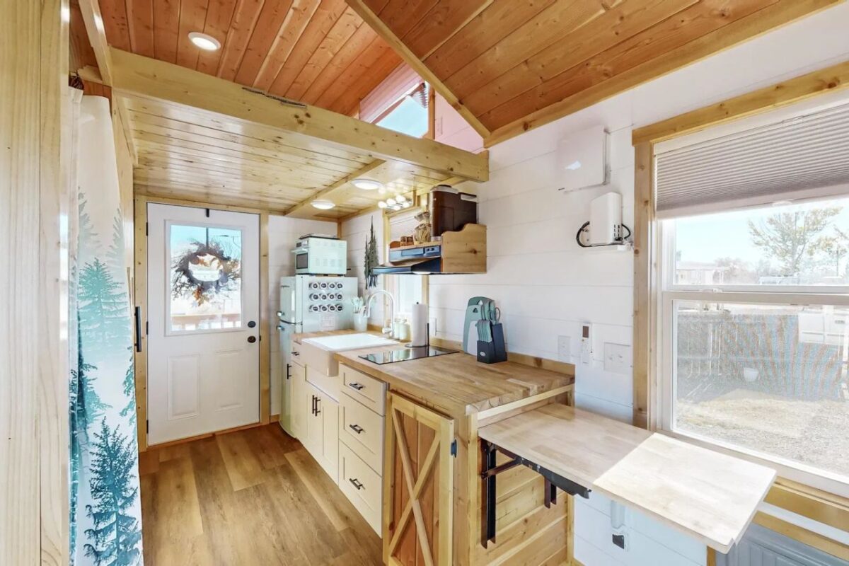Evergreen Tiny House is Cottage on Wheels With Country Charm