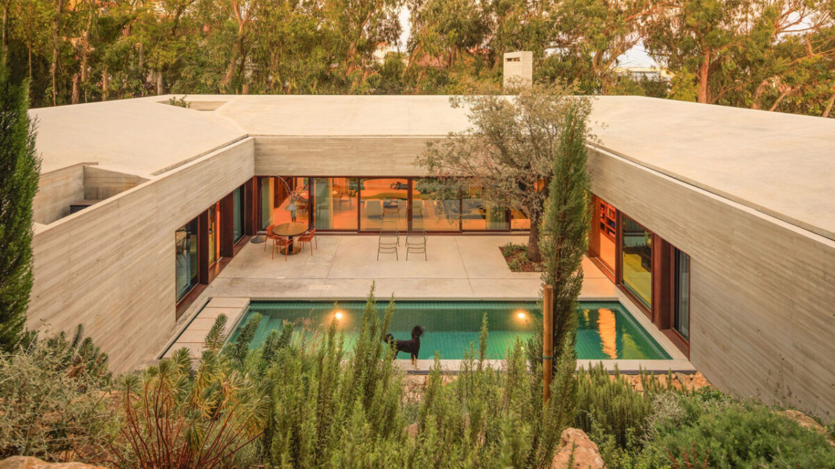 U-Shaped House in Portugal is Partially Buried Into Ground