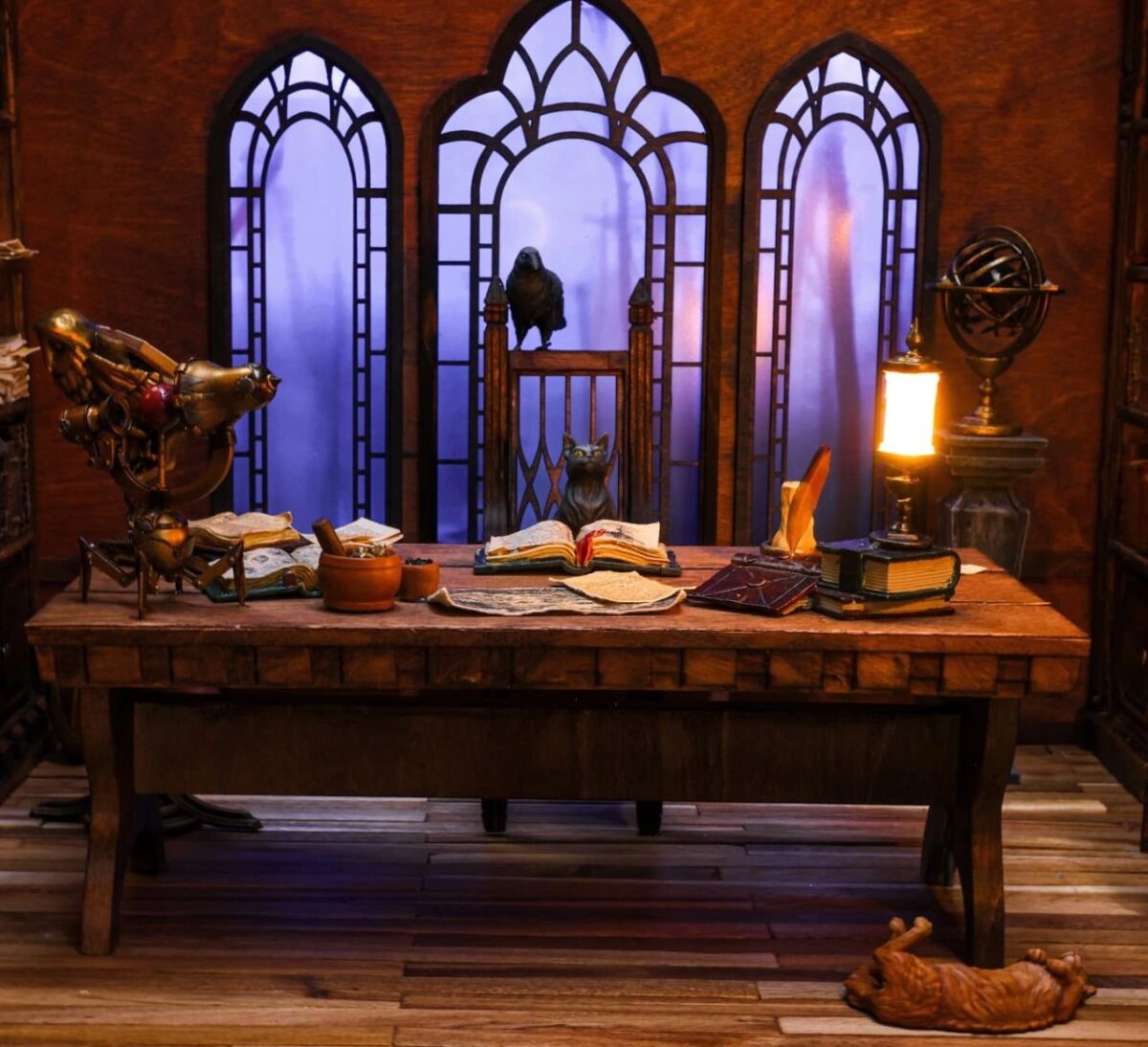 This Magical Coffee Table has a Miniature Wizard’s Library Inside