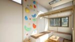 Funhouse Tiny Home Adds Fun With Climbing Wall in Living Room