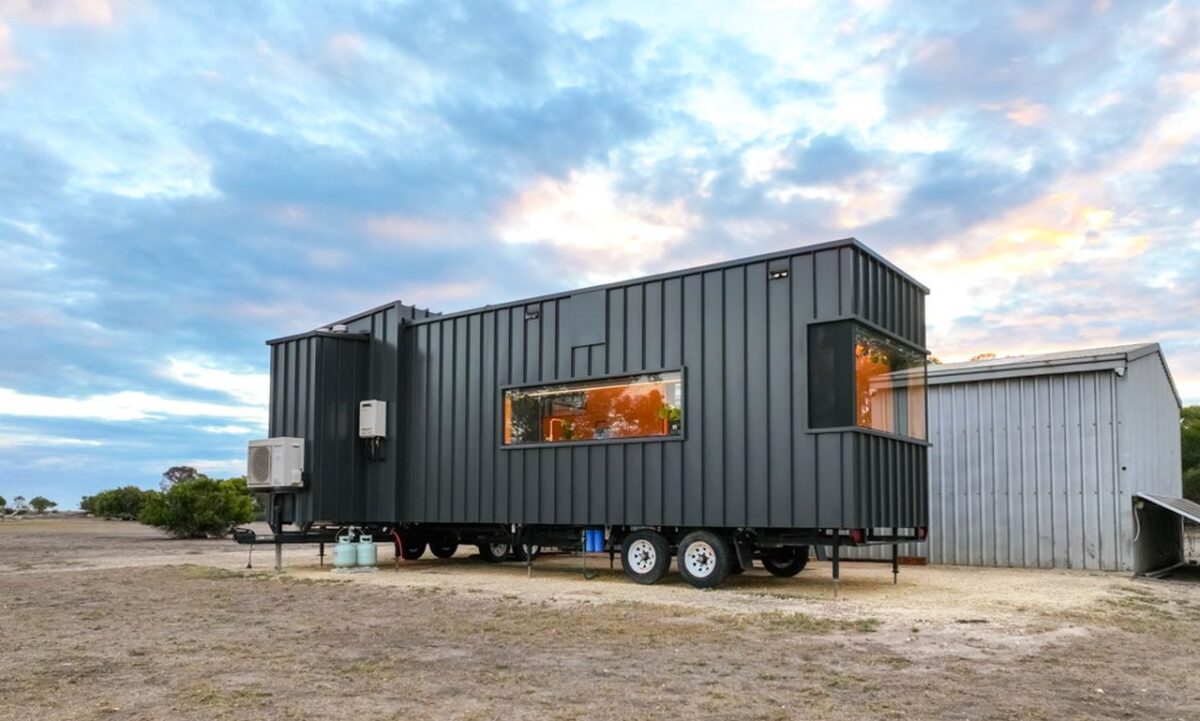 Man Builds Two-Trailer Tiny House That Splits for Transportation