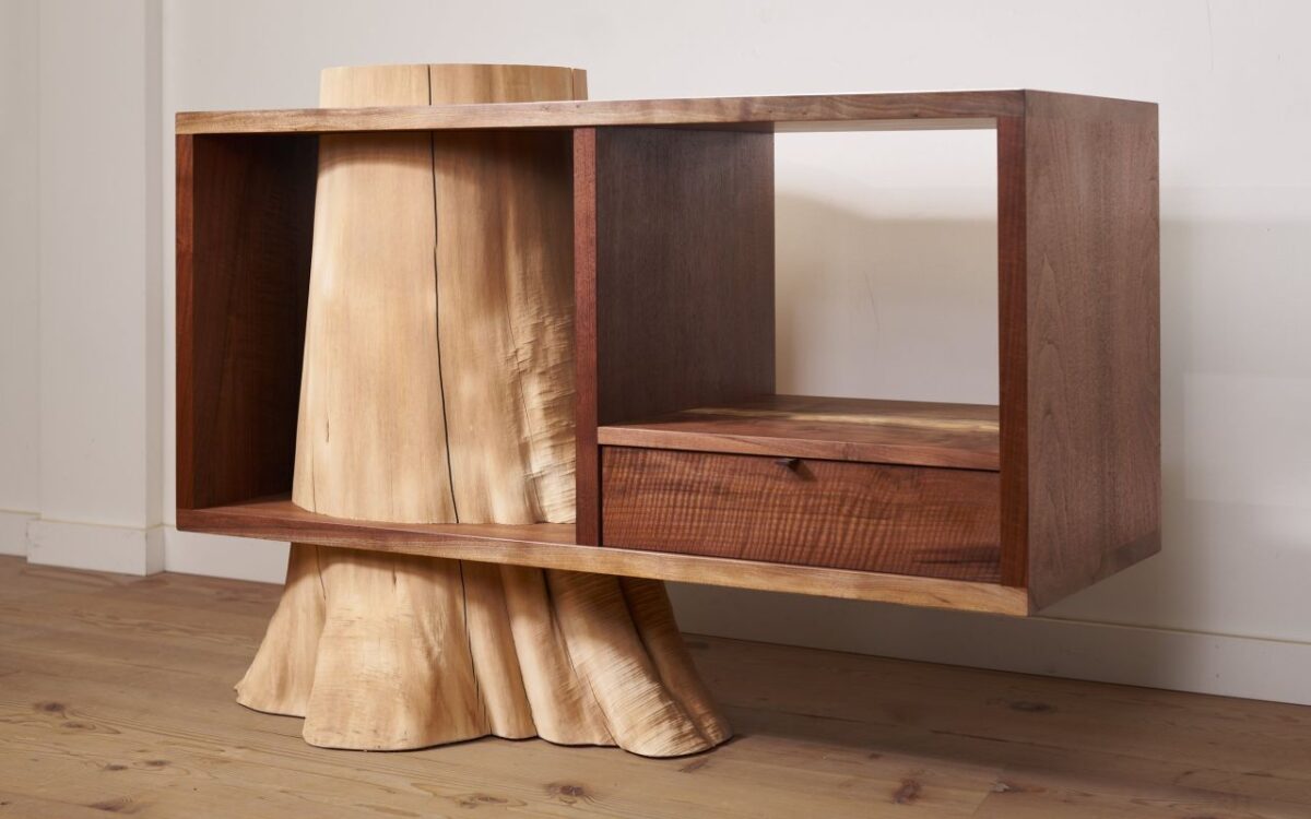 Greg Klassen Rests Entire Table on Solitary Cedar Tree Stump Leg