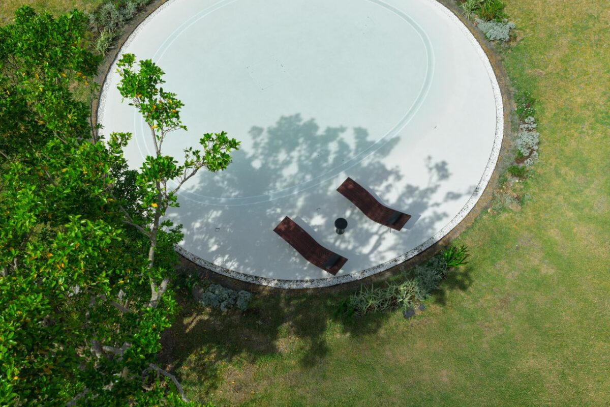 Circular Building in Japan has Green Roof to Disappear in Nature