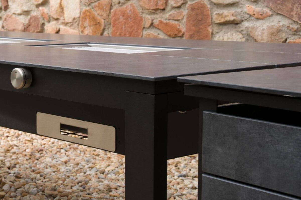 FESTÁVOLO Outdoor Table Features Hidden Gas Grill at Center