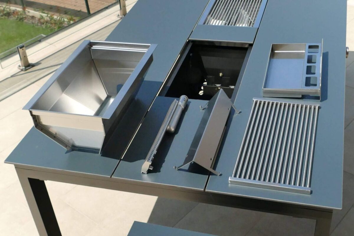 FESTÁVOLO Outdoor Table Features Hidden Gas Grill at Center