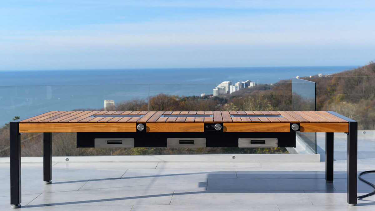 FESTÁVOLO Outdoor Table Features Hidden Gas Grill at Center