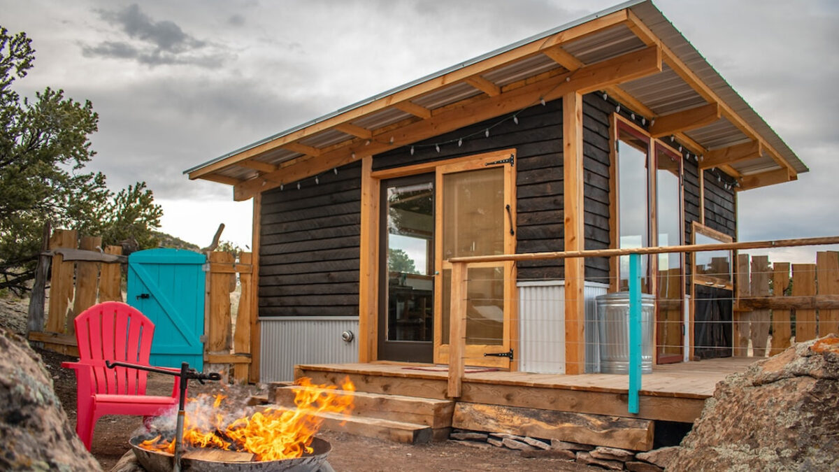 Off-Grid Colorado Cabin Lets You Roll the Bed out Onto Balcony